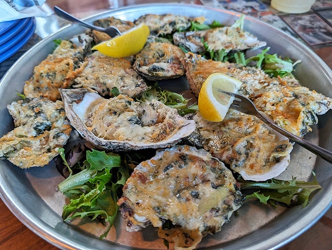 Oysters Rockefeller that would make the Vanderbilts jealous. These briny beauties are transformed into creamy, herb-topped treasures served on a bed of fresh greens.