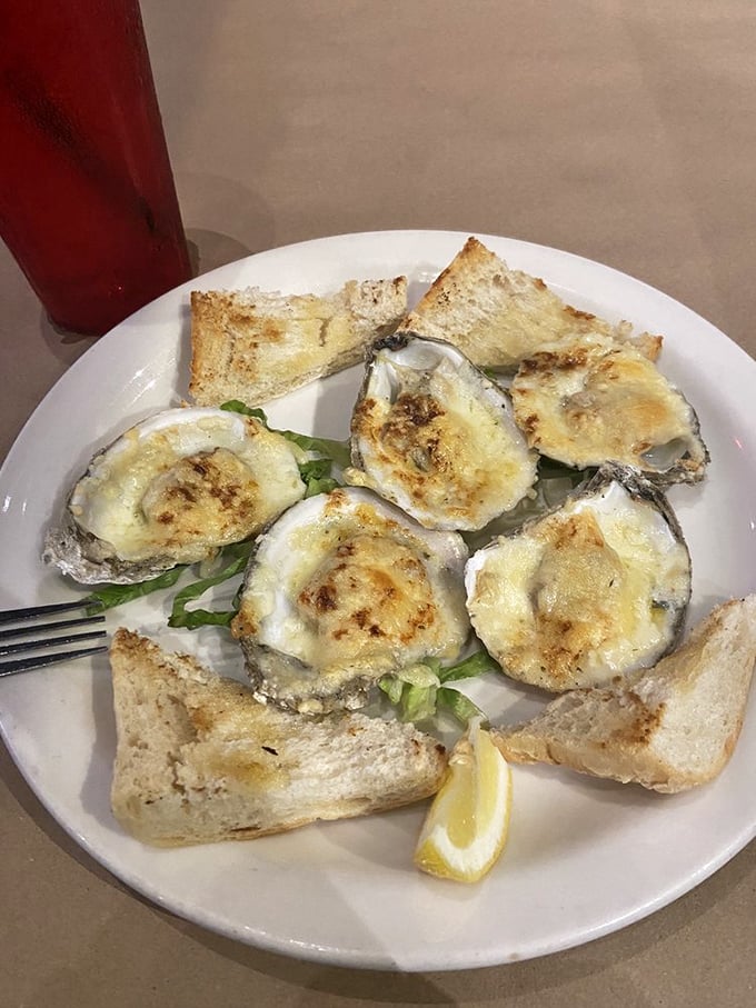 Oysters Rockefeller – where briny treasures meet buttery, cheesy decadence. These little jewels make you forget you're hundreds of miles from any coast.