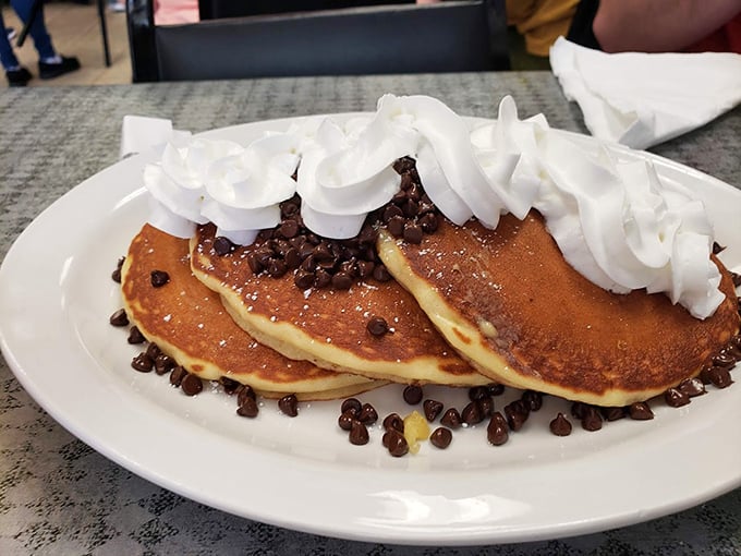 Chocolate chip pancakes with whipped cream – because sometimes breakfast should feel like you're getting away with something deliciously naughty.