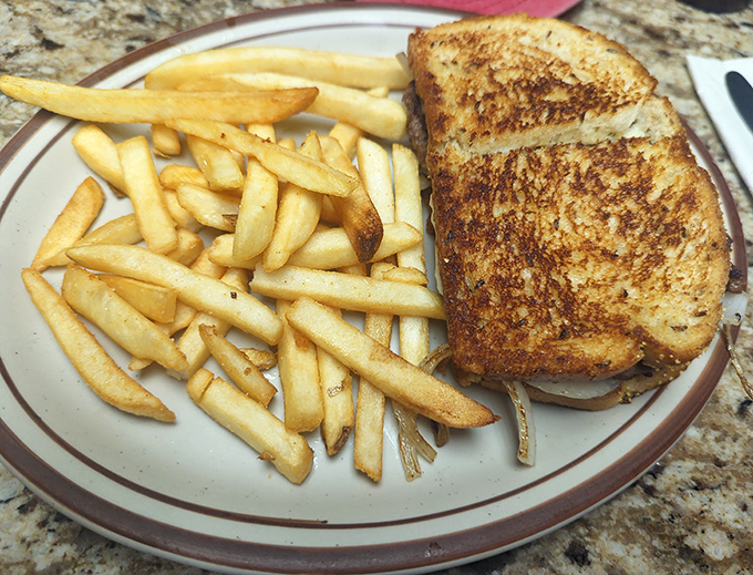 Golden Texas toast embracing a juicy patty—this patty melt understands the assignment and aces the final exam.