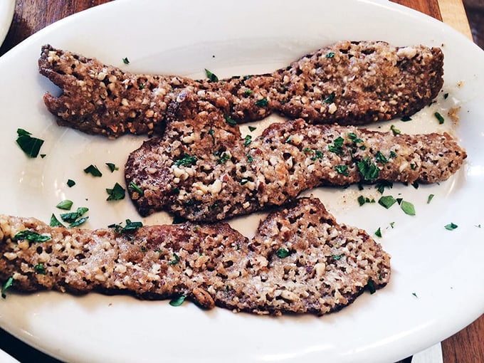 Pecan bacon strips crusted with sweet, nutty perfection that'll make you question everything you thought you knew about breakfast meat.