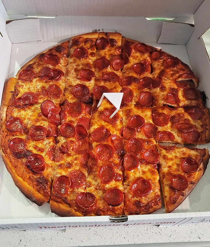 The pepperoni pizza that launched a thousand cravings—those perfectly curled cups of pepperoni holding tiny pools of flavor are nature's shot glasses.