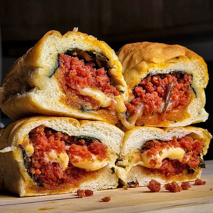 Pepperoni rolls sliced open to reveal their glorious filling—West Virginia's greatest contribution to portable breakfast foods and it's not even close.