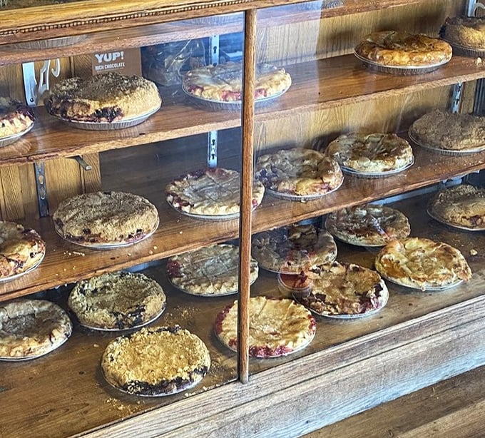 Pie paradise exists, and it's in Rolla, Missouri. Each tin holds a different path to happiness—choose your adventure wisely.
