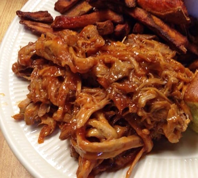 Pulled pork piled high enough to require structural engineering, yet tender enough to fall apart at hello.