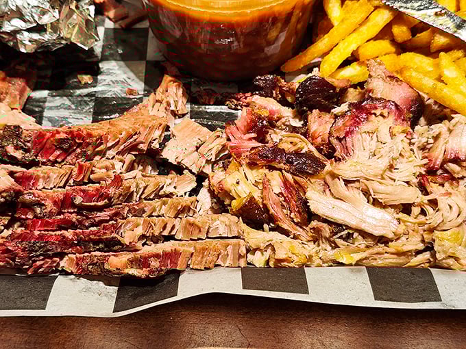 Pulled pork that's had a proper introduction to smoke and time. Those bark-studded edges are where the flavor magic happens—the BBQ equivalent of striking gold.