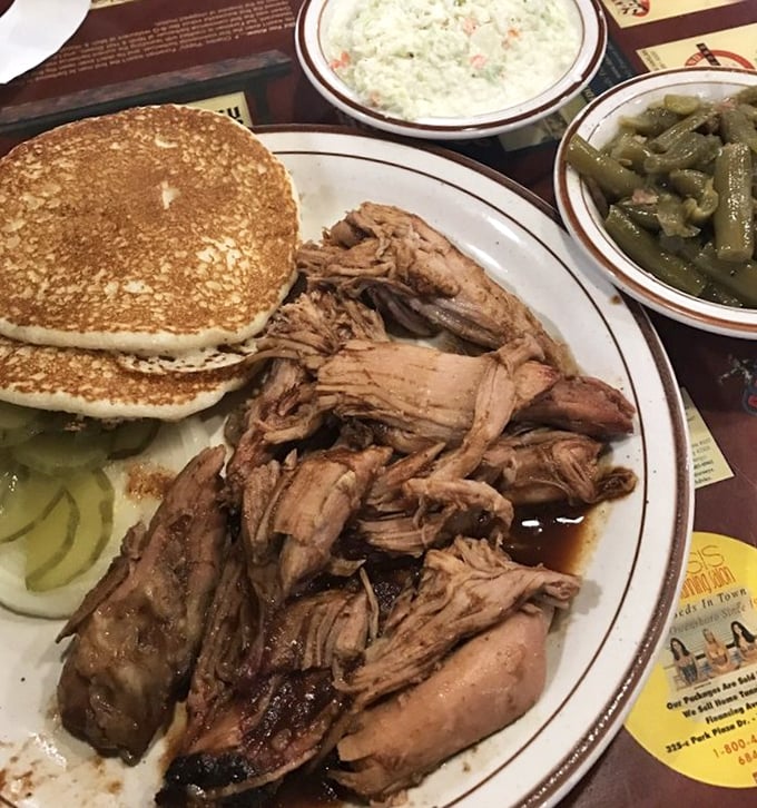 Pulled pork with all the fixings – tender strands of smoky goodness alongside pancakes and green beans. Kentucky's version of a balanced diet!