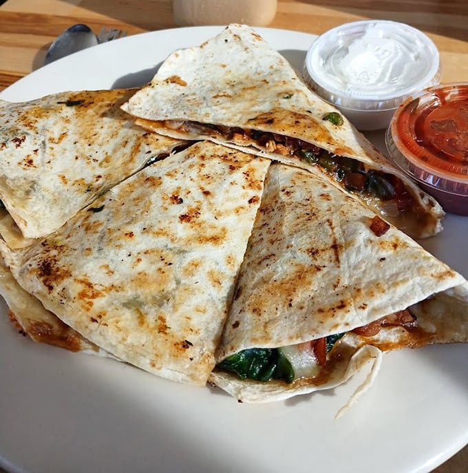 Quesadillas that achieve that perfect golden-brown exterior while maintaining their gooey, cheese-pulling interior—a textural tango worth experiencing.