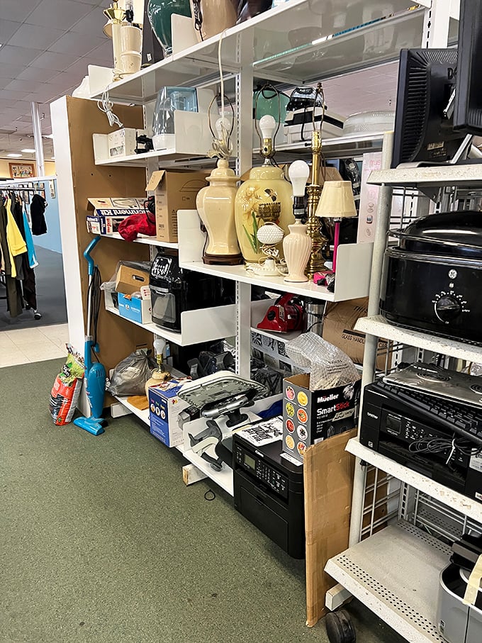 Shelf after shelf of household possibilities! From vintage lamps to kitchen appliances still in boxes, it's like a time capsule of American domesticity.