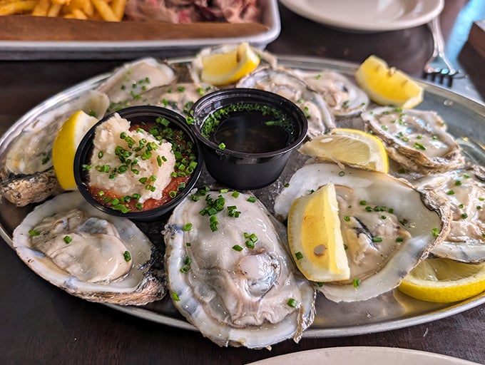The ocean meets Kentucky in this glistening platter of raw oysters. Fresh, briny jewels served with classic accompaniments—nature's perfect appetizer.
