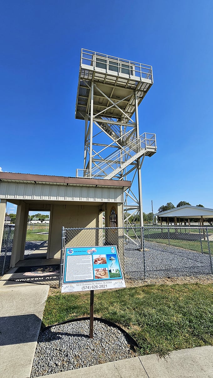 This observation tower reaches skyward like a sentinel of history, standing watch over aircraft that once defended our freedom from much higher altitudes.