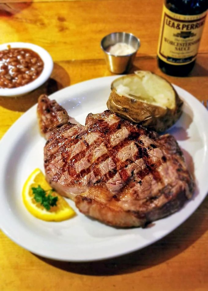 A steak that means business. Those perfect grill marks aren't just for show—they're flavor signatures on a canvas of perfectly aged beef.