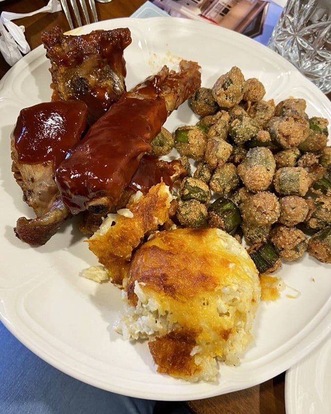 These ribs aren't just falling off the bone—they're practically jumping onto your fork. Paired with fried okra and cheesy potatoes, it's a Southern trifecta.