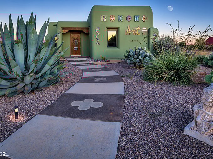 Rokoko Art Gallery emerges from the desert like a vibrant mirage, surrounded by agave sentinels and the kind of sunset that makes painters weep with joy.