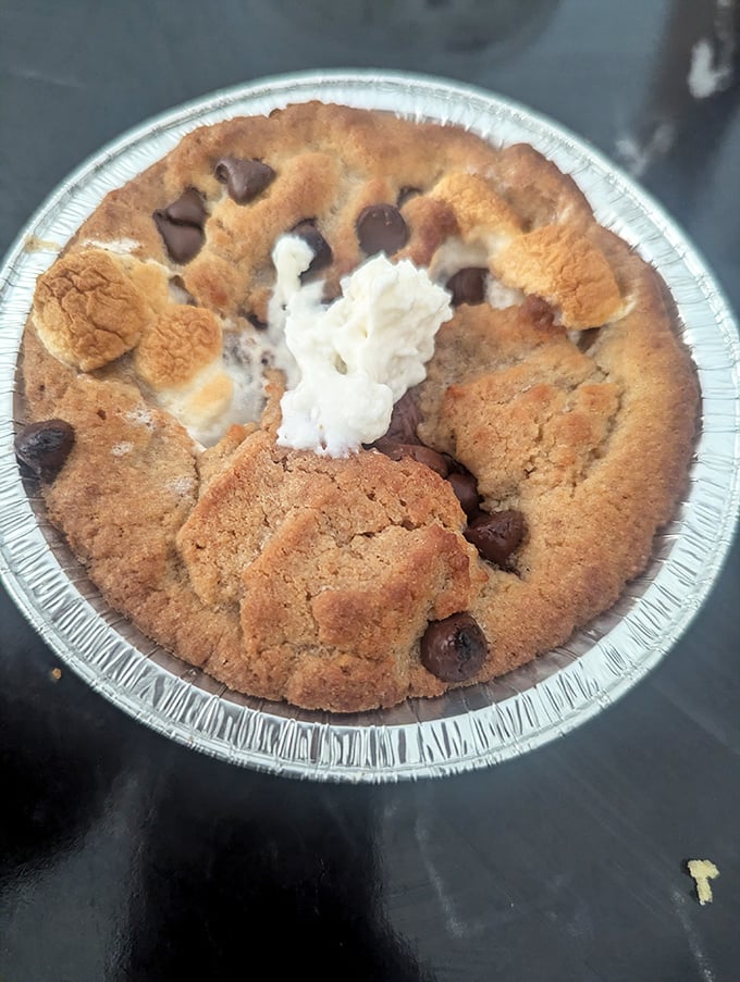 This s'mores pie doesn't just satisfy your sweet tooth – it throws a full-blown dessert party complete with marshmallows, chocolate, and nostalgia.
