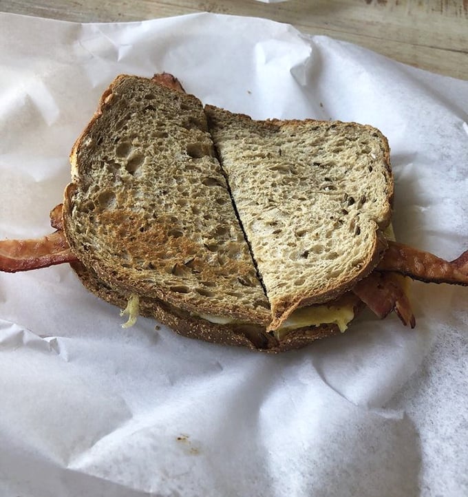 The humble sandwich elevated to art form – hearty bread, quality ingredients, and that magical touch that makes you wonder why yours at home never taste this good.