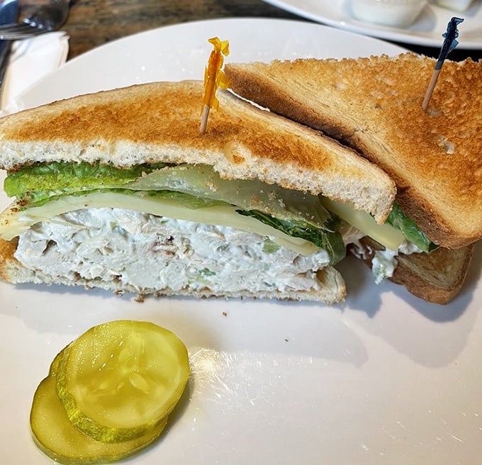 Between two perfectly toasted slices lies the architectural wonder of a proper diner sandwich – sturdy, generous, and requiring a strategic first bite.