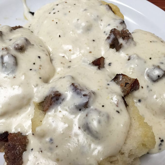 Biscuits swimming in creamy sausage gravy—the South's answer to everything that ails you. Comfort food in its purest form.