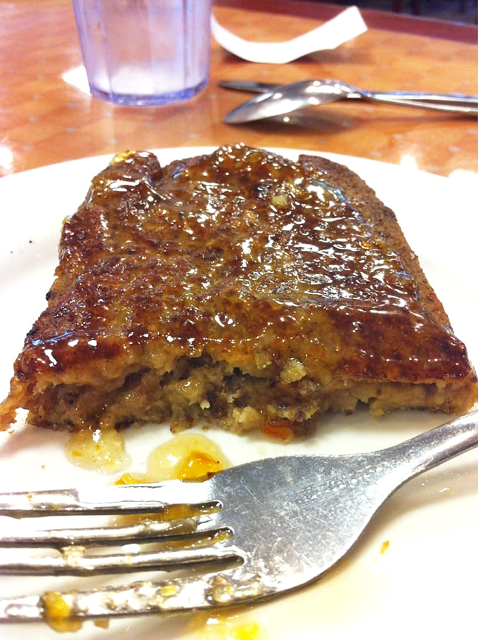 What looks like meatloaf's sophisticated cousin is actually moussaka—layers of eggplant, seasoned meat, and béchamel sauce in perfect harmony.