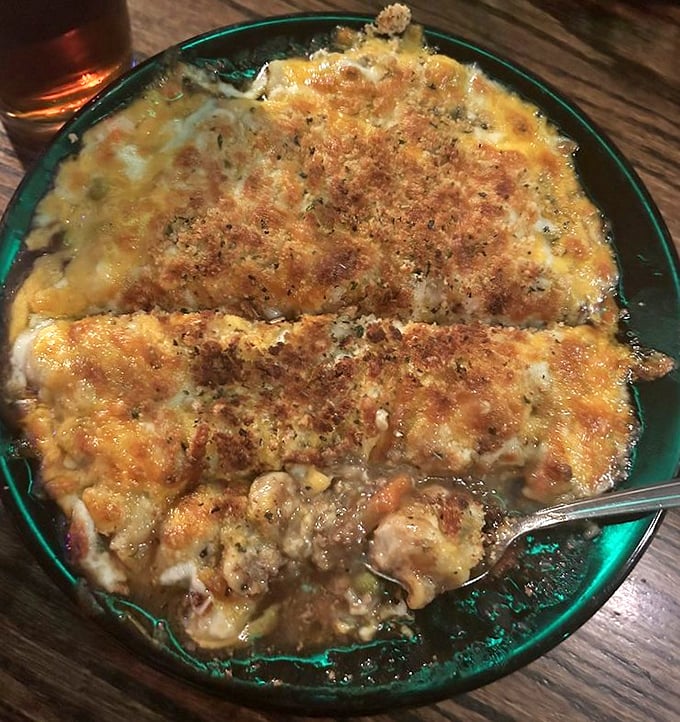 Shepherd's Pie that would make an Irish grandmother weep with joy – bubbling cheese crust giving way to savory depths of perfectly seasoned meat and vegetables.