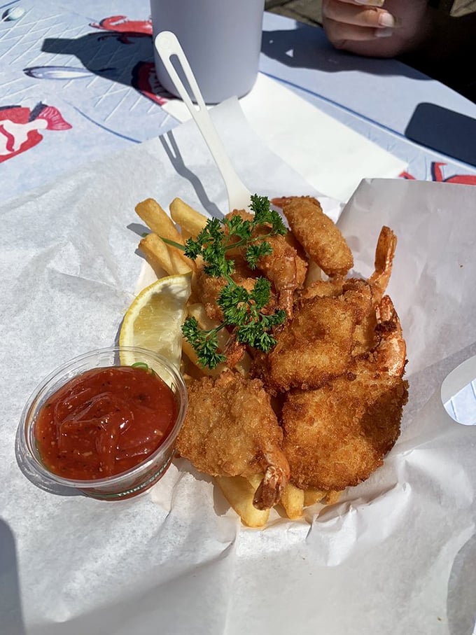 These golden shrimp aren't just fried – they're transformed into crispy crustacean jewels that make the perfect seafood treasure hunt.