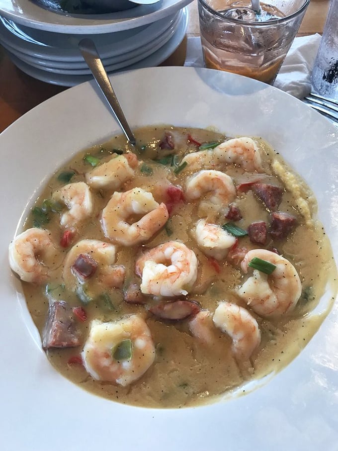 Shrimp and grits that would make a Lowcountry grandmother weep with joy—plump shrimp lounging in creamy goodness.