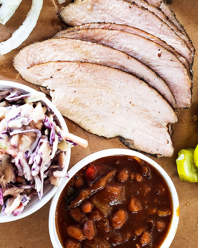 Turkey that will forever ruin your Thanksgiving memories – impossibly juicy, perfectly pink, and proof that poultry can hang with the brisket big boys.