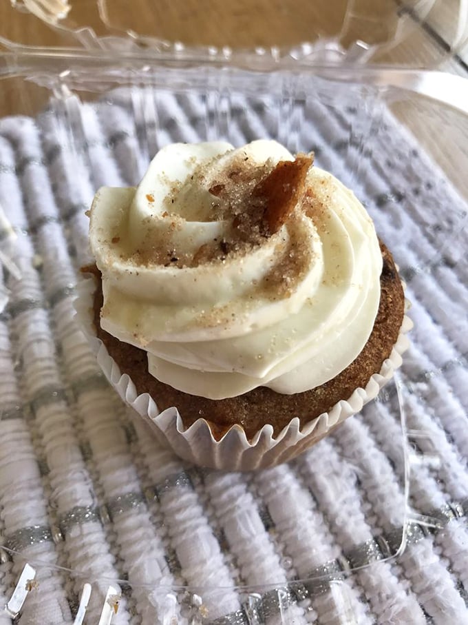 The Snickerdoodle cupcake doesn't just whisper cinnamon—it serenades you with it, topped with a swirl of frosting that defies gravity.