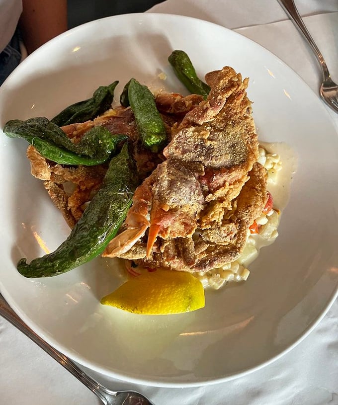 Soft shell crab perched atop risotto like a crispy crown jewel—proof that sometimes the best things in life require a little crunch.