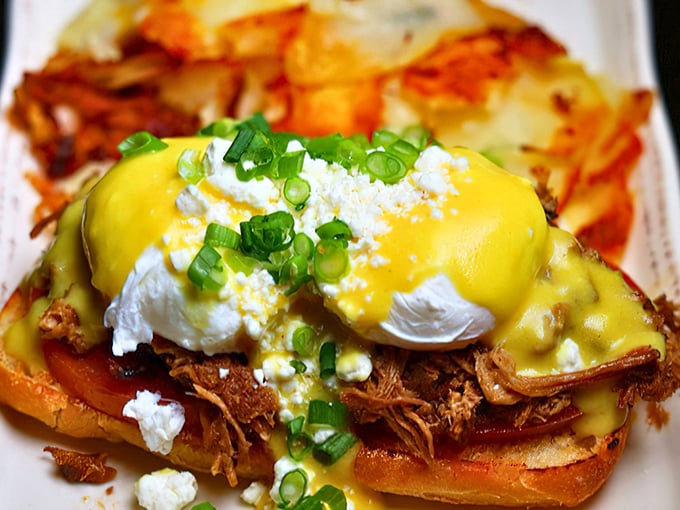 The Southwest Benedict performs a delicate balancing act—rich hollandaise cascading over perfectly poached eggs and pulled pork that would make any Texan nod in approval.