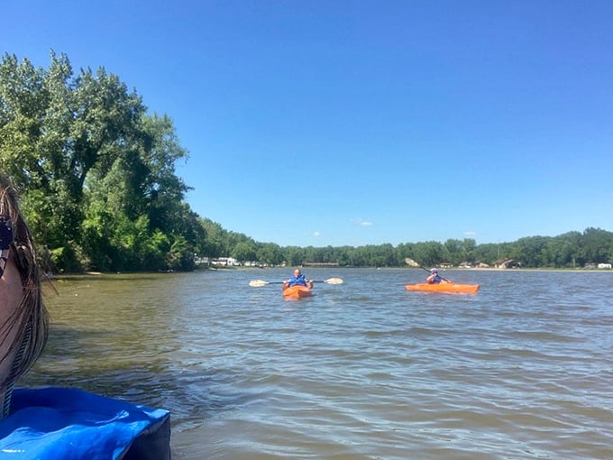 Kayakers paddle across Spring Lake's tranquil waters, proving retirement in Jefferson means adventure is just as accessible as affordability.