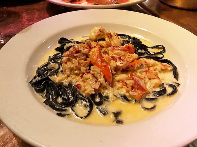 Squid ink linguine looking mysterious and elegant, like a tuxedo you can eat with a fork.