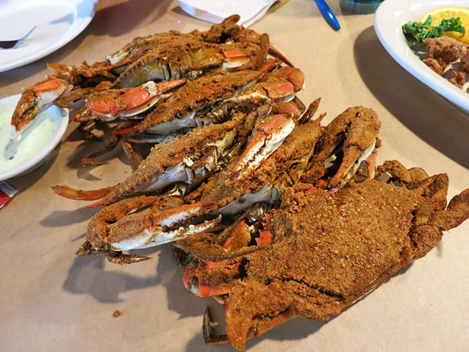 Old Bay-crusted steamed crabs – Maryland's version of a sacred ritual. Grab your mallet and prepare for delicious work.