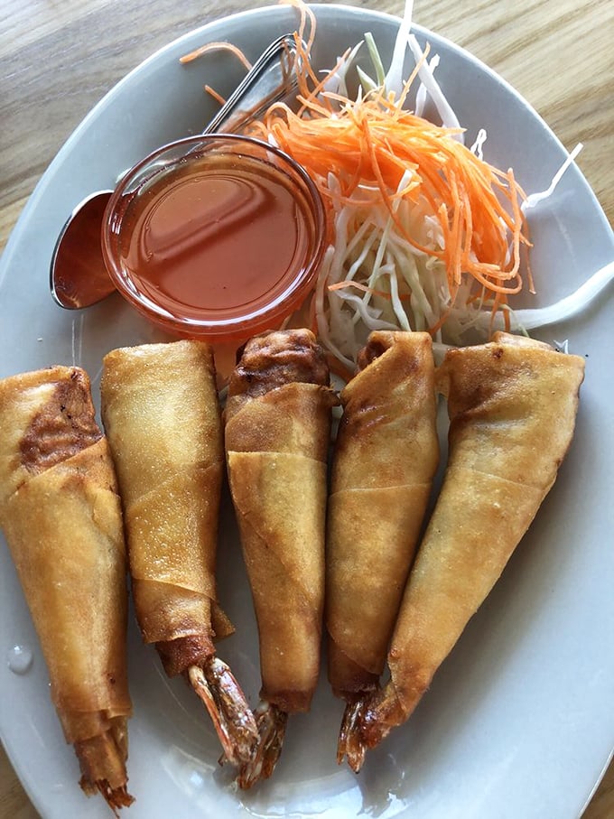 Golden-fried shrimp rolls that crackle with each bite – the culinary equivalent of popping bubble wrap, but infinitely more satisfying.