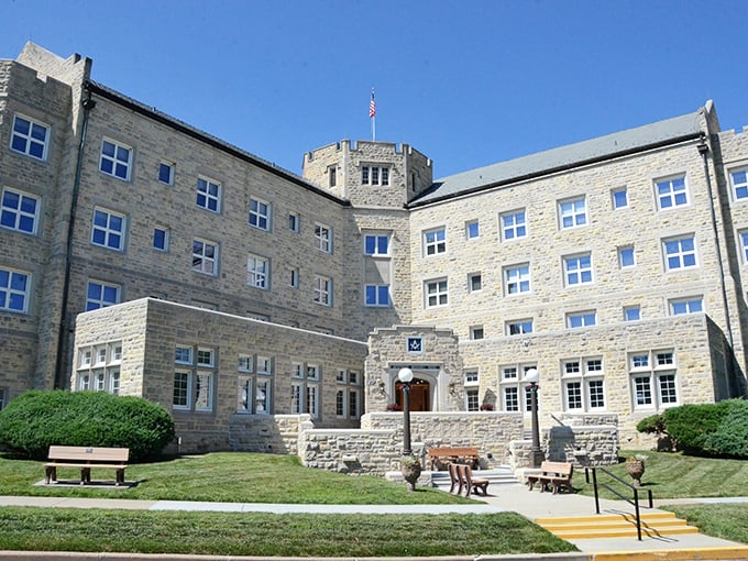 The majestic Nebraska Masonic Home stands like a limestone castle, its sturdy walls housing stories as solid as its foundation.
