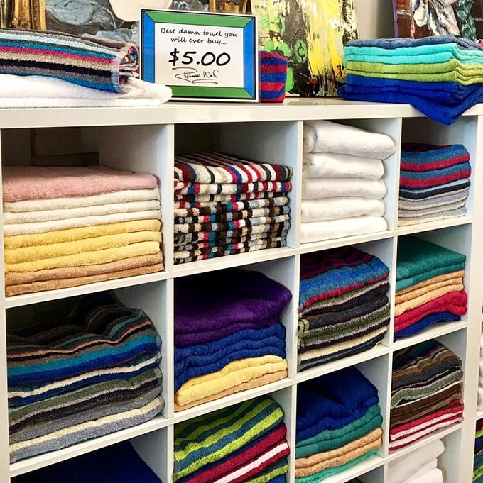 "Best damn towel you will ever buy..." The sign doesn't lie. These aren't your standard bathroom accessories—they're color-coded time travelers from better-made decades.