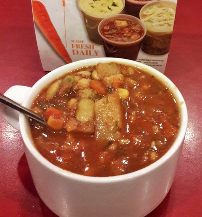 A bowl of vegetable soup that puts most home kitchens to shame – hearty, rich, and packed with enough vegetables to make your mother happy.