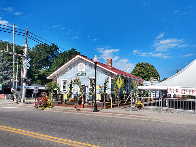 Small-town Americana at its finest. This quaint white station house, with its classic architecture, has welcomed rail enthusiasts for generations.