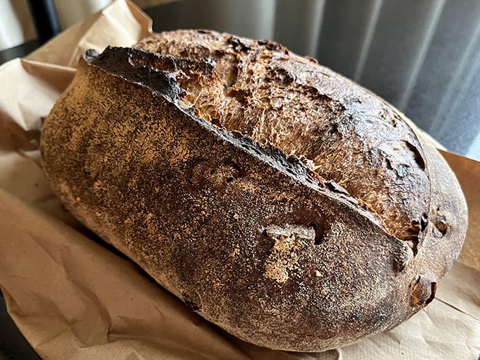 This country loaf has the kind of crust that announces itself with a satisfying crackle. It's not just bread—it's an acoustic experience with butter.