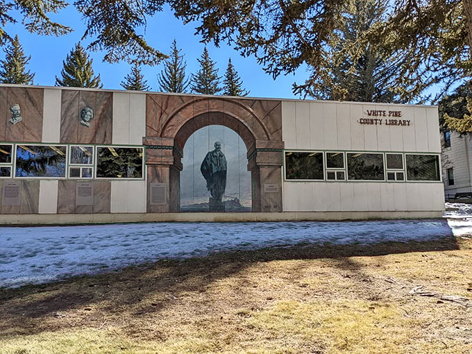 The White Pine County Library wears its trompe-l'oeil mural like a badge of honor, proving small towns appreciate art too.