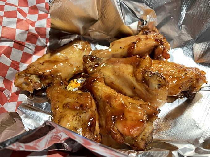 These wings didn't just fly under the radar – they soared right into flavor country with a glossy sheen that promises sticky fingers and zero regrets.