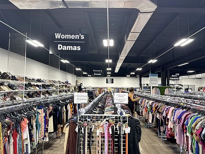 The women's department stretches as far as the eye can see, with bilingual signage welcoming all shoppers to this fashion wonderland.