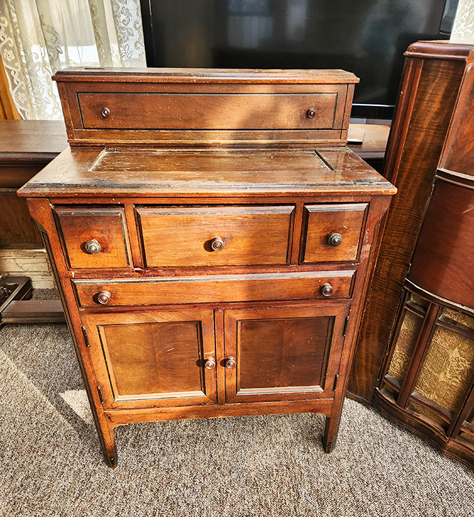 This antique cabinet has probably witnessed more family dinners than your favorite sitcom—and has the patina to prove it.