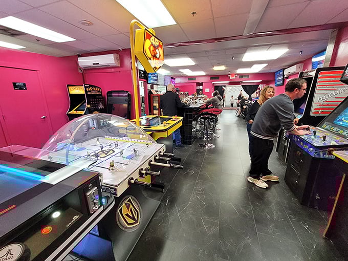 The arcade section: where adults pretend they're bringing their kids while secretly planning to beat their own high scores from 1985.
