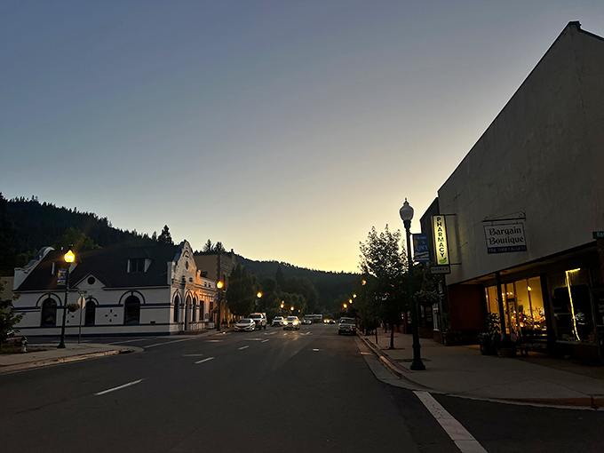 Downtown Quincy at dusk—when the street lamps flicker on and the Sierra silhouette reminds you you're not in Kansas anymore.