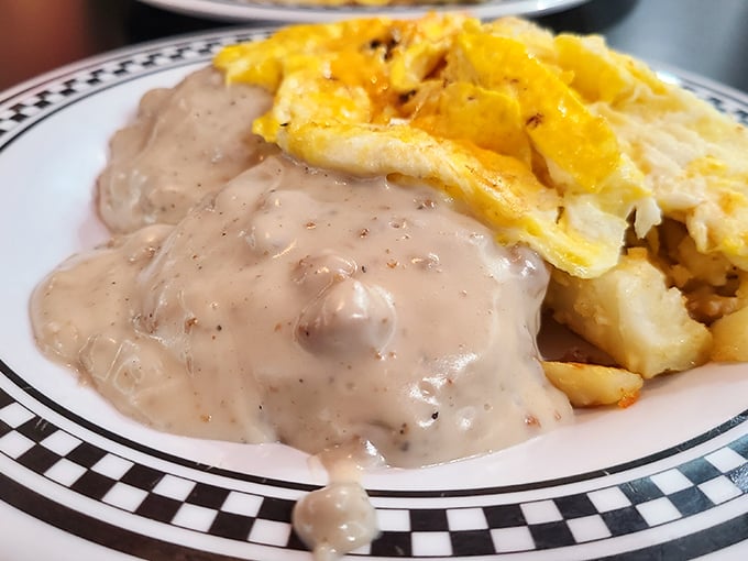 Biscuits and gravy: Southern comfort meets Maryland morning. This plate doesn't just speak to your hunger—it writes it poetry.