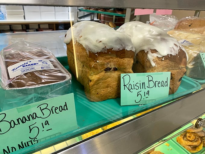 Raisin bread and banana bread sitting side by side like old friends, both generously topped and ready to make your morning infinitely better.