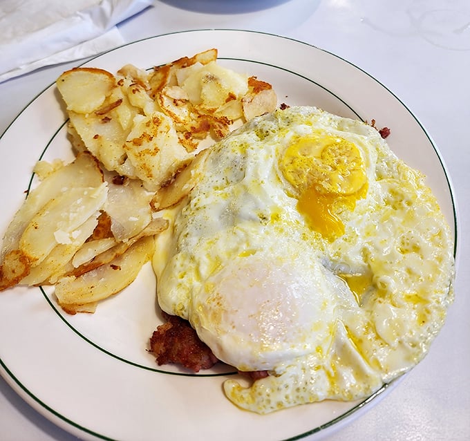 Sunny-side up eggs and home fries – the breakfast equivalent of a warm hug from your favorite aunt.