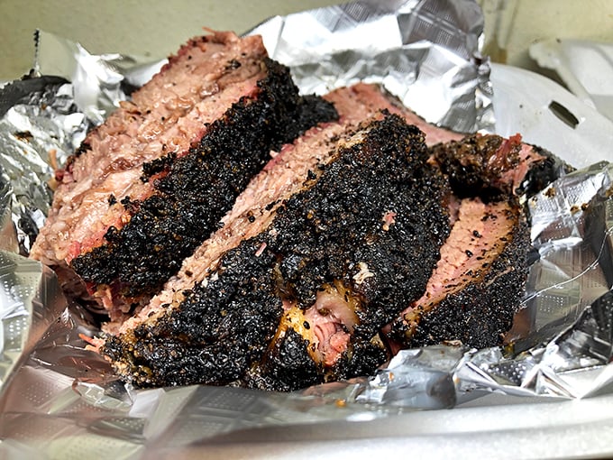 Brisket with a bark so perfect it deserves its own exhibition. That smoke ring is the barbecue equivalent of a Rolex – pure craftsmanship.