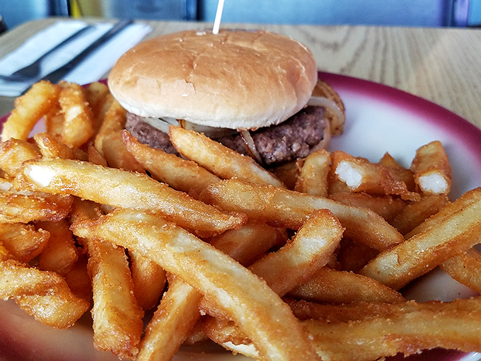 These aren't just fries—they're golden ambassadors from the kingdom of comfort food, escorting their burger royalty.